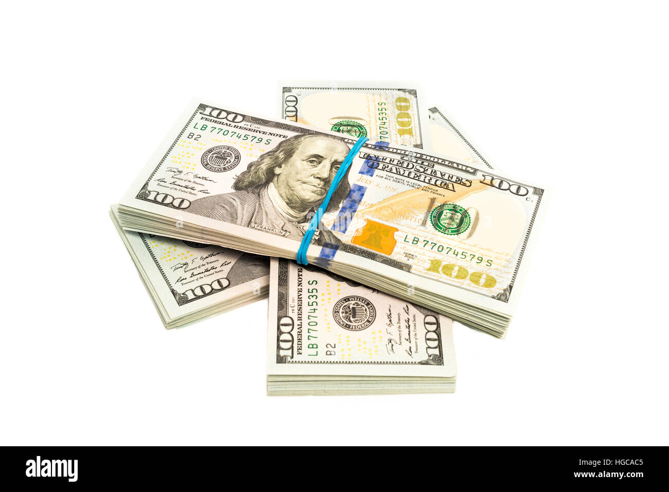 Stacks of dollars in hundred dollar banknotes isolated Stock Photo - Alamy