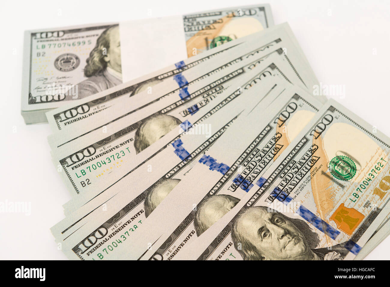 Stack of cash money in hundred dollar banknotes Stock Photo - Alamy