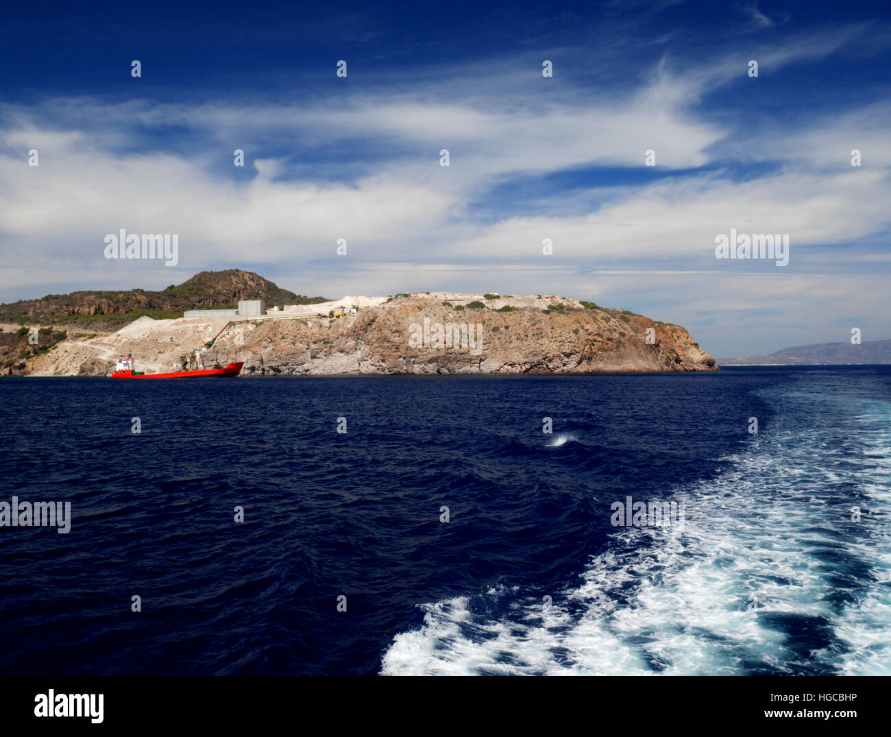 Perlite mines, Gyali, Nisyros, Greece. Ship being loaded by conveyor ...