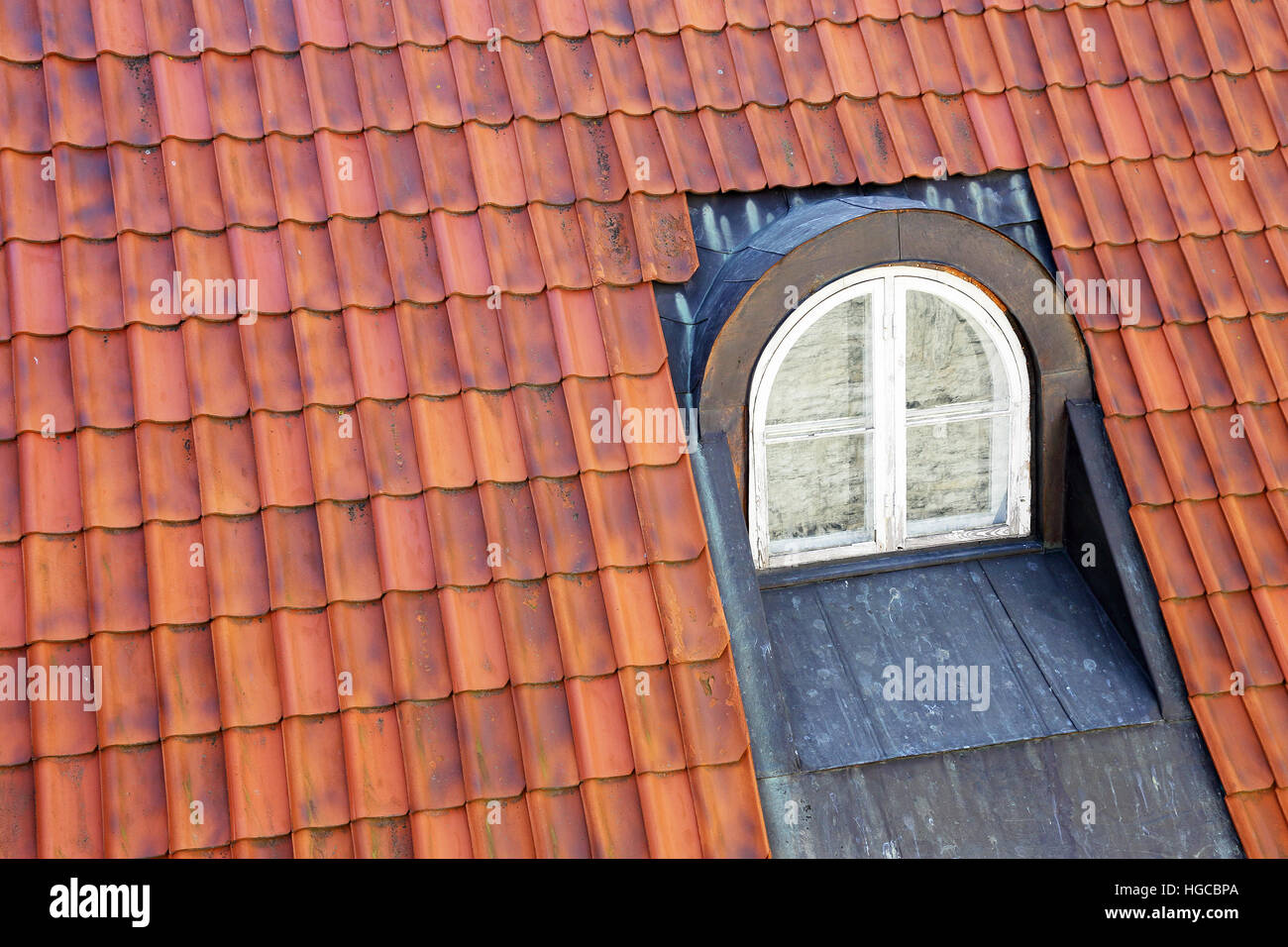 garret window on a roof of the old house Stock Photo - Alamy