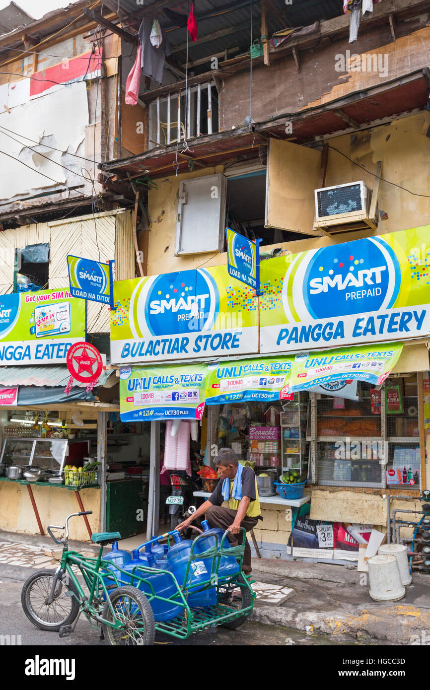 Local shops and residents, Intramuros, Manila, Philippines Stock Photo ...
