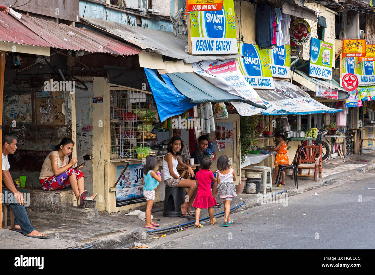 Local shops and residents, Intramuros, Manila, Philippines Stock Photo ...