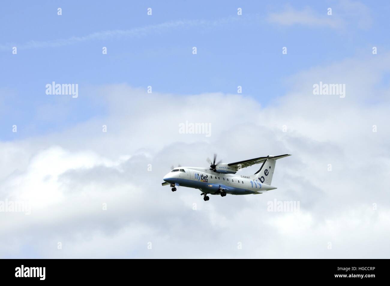 Flybe twin prop aircraft landing Stock Photo - Alamy