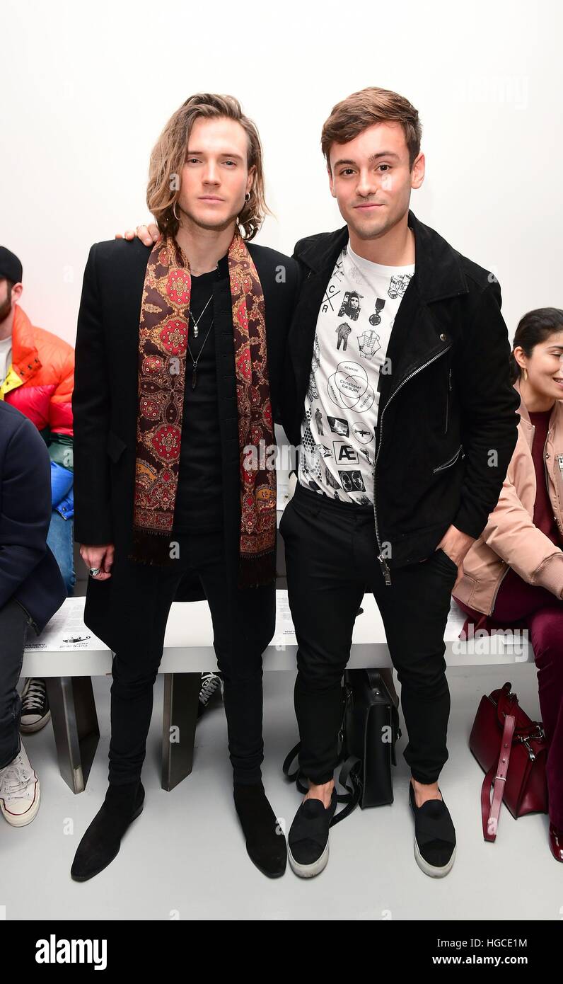 Dougie Poynter (left) and Tom Daley on the front row during the ...