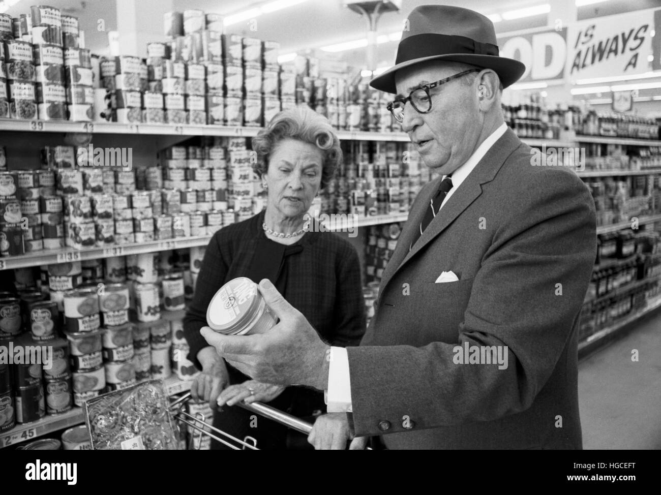 Charles G. Mortimer, shopping for General Foods products with his wife ...