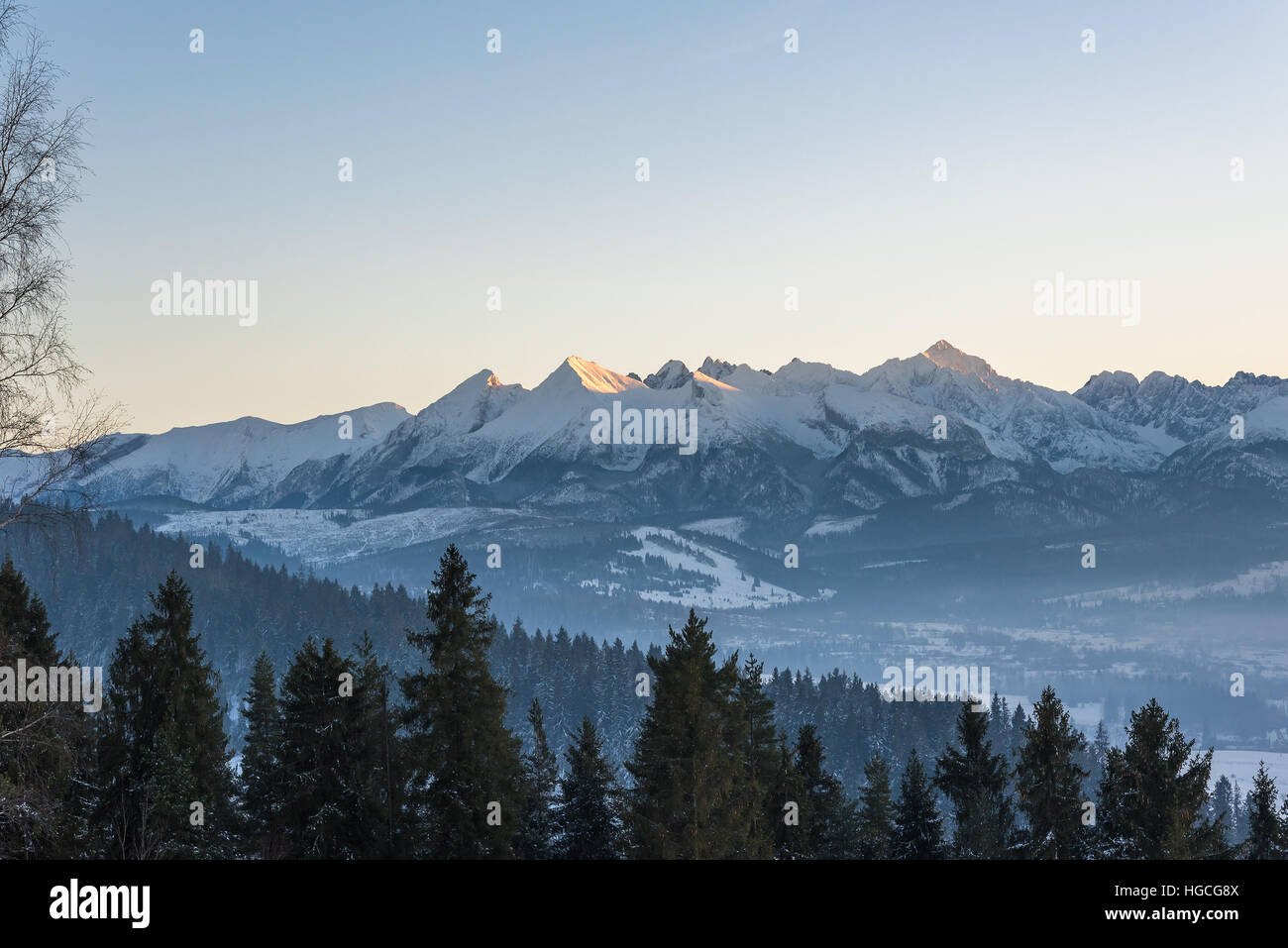 Winter landscape of Tatra Mountains in Poland at sunset Stock Photo - Alamy