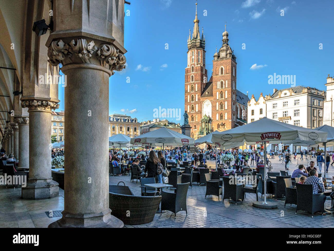 Krakow, Poland - July 07, 2016. Tourists relaxing on main market square ...