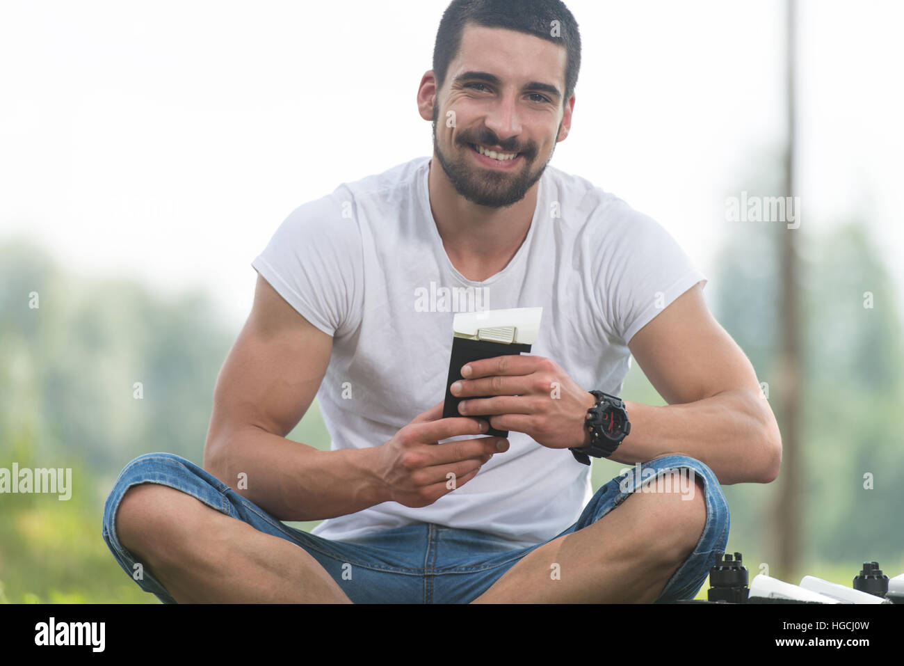 Closeup of Young Engineer Man Checking the Battery of Uav Drone With ...