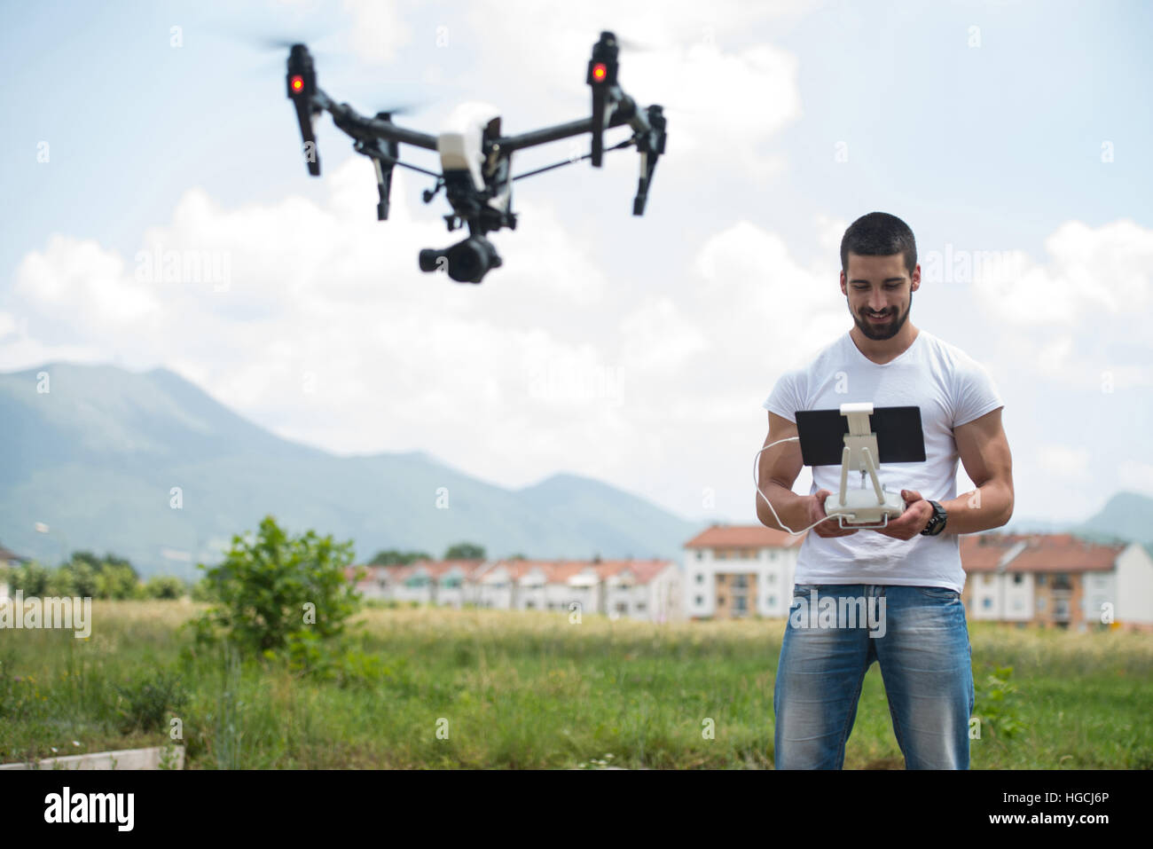 Man playing control drone helicopter hi-res stock photography and ...