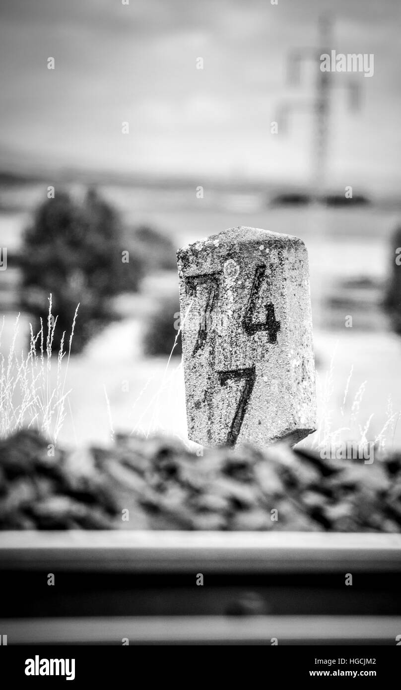 Railroad stone mark Stock Photo - Alamy