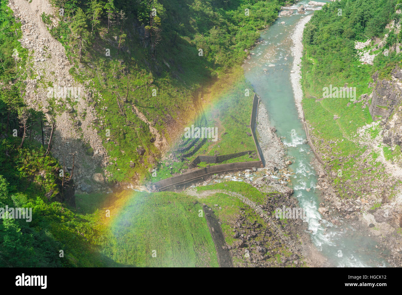 Kurobe dam with rainbow,Tateyama Kurobe Alpine Route ,Japan Stock Photo ...