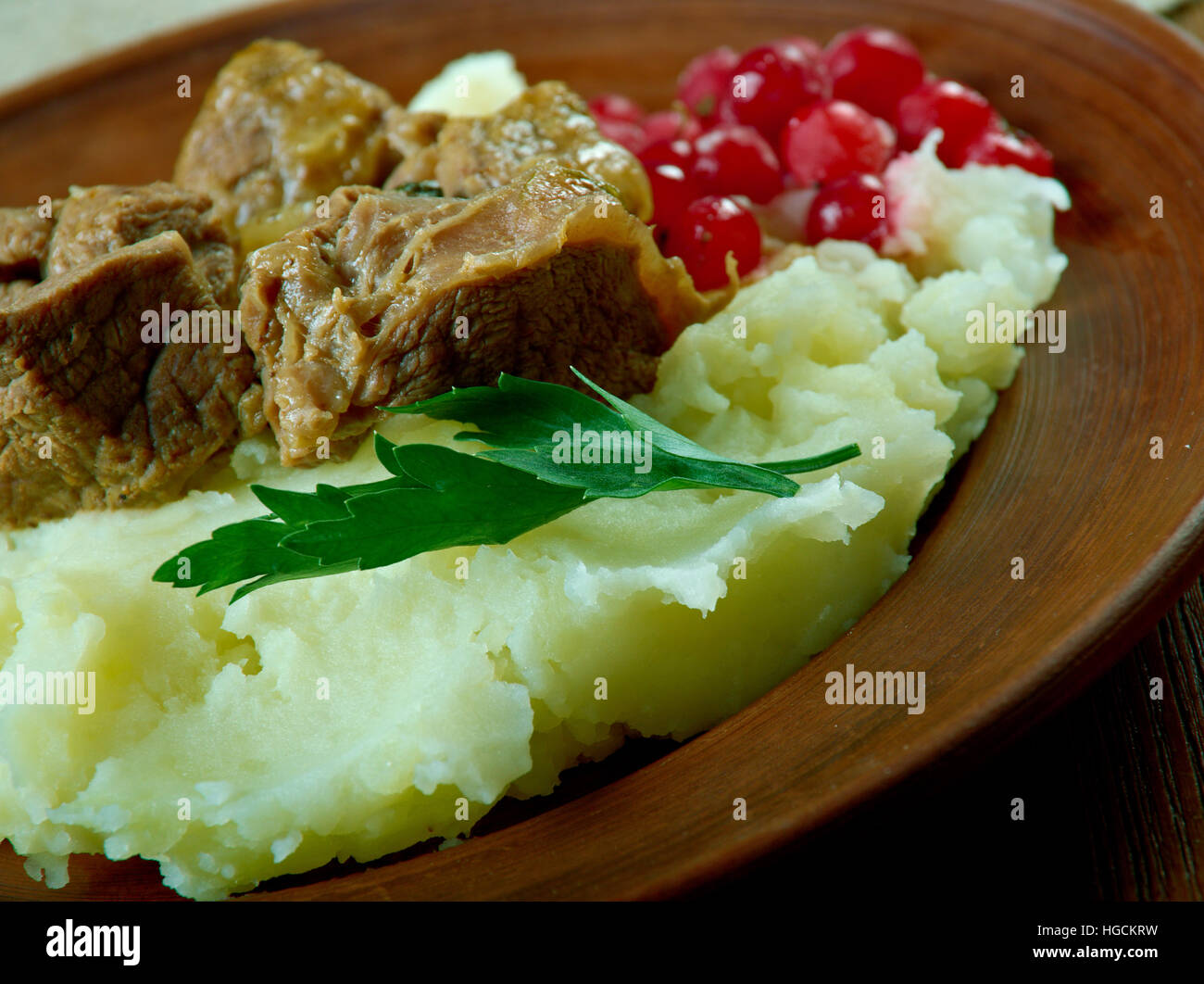Sauteed reindeer venison steak served with mashed potatoes and ...