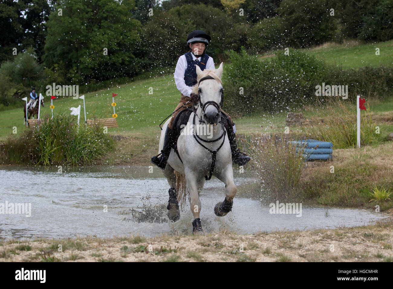 Horse And Rider Galloping Cross Country High Resolution Stock ...
