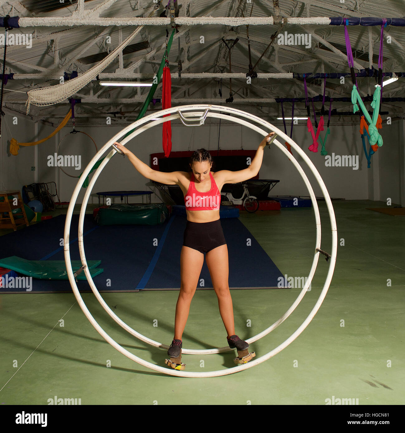 Young woman gymnast on a hoop Stock Photo - Alamy