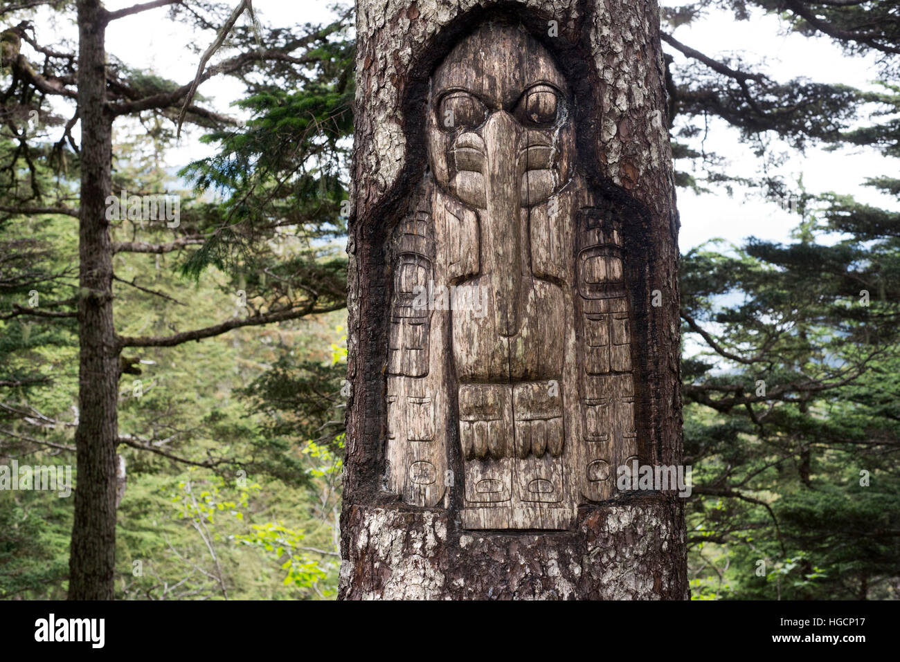 Sign, The Raven clan territory, tree carving, Tlingit Indians, Juneau ...
