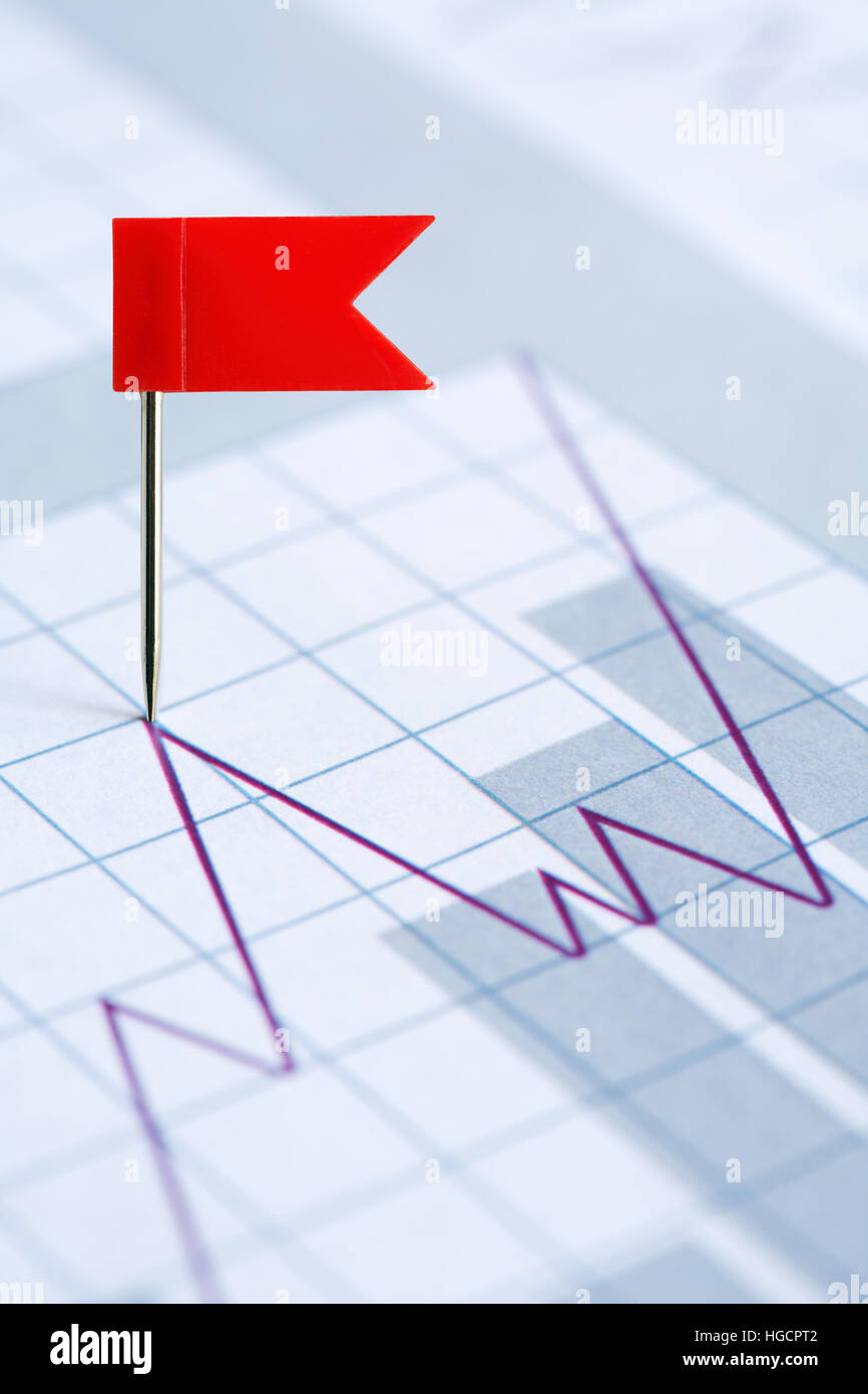 Business concept. Red flag thumbtack on paper background with business ...