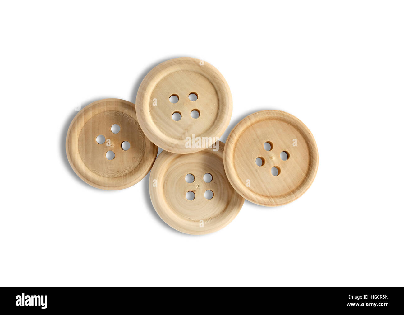 Few wooden buttons on white background. Clipping path is included Stock ...