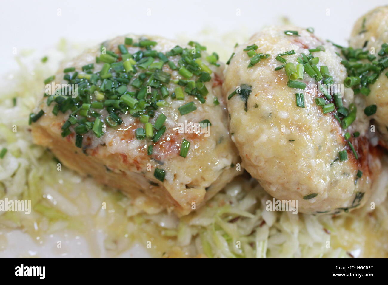Tyrolean traditional dish, knodel or canederli with parsley Stock Photo ...