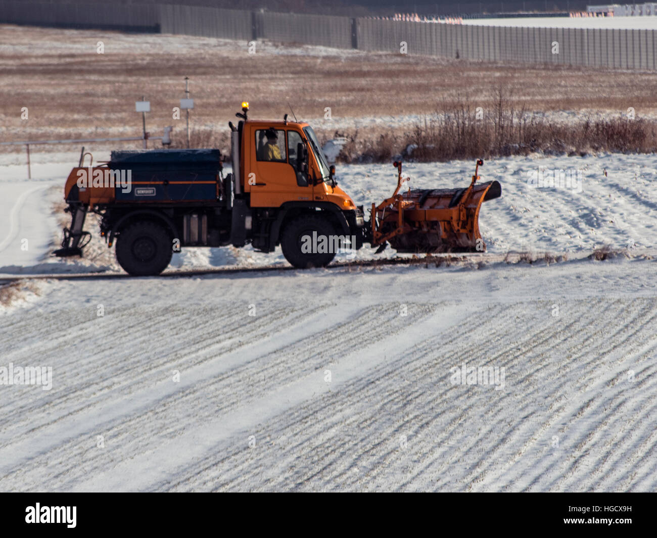 Mercedes Unimog clearing street from snow in Winter, Germany Stock ...