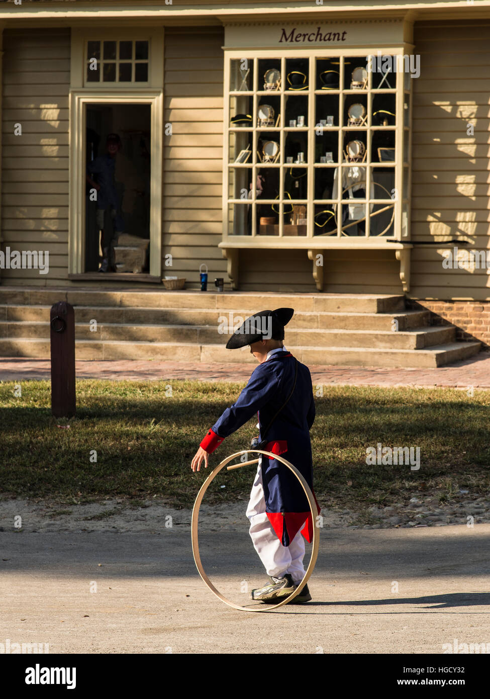 Colonial Williamsburg young boy costumed interpreter playing with hoop ...