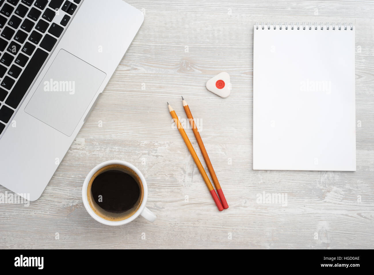 Two pencil, eraser and coffee on the table Stock Photo - Alamy