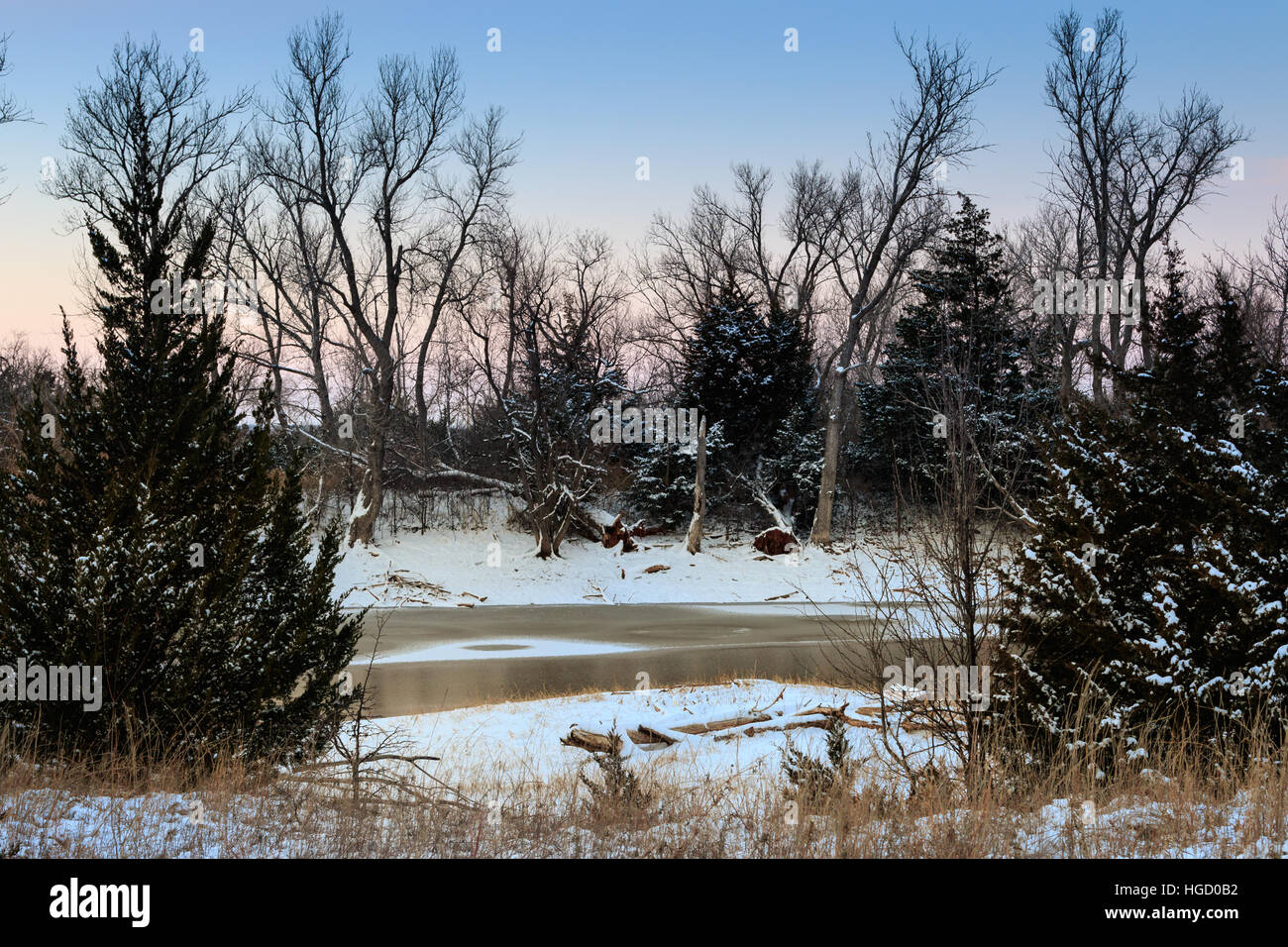 A small pond in winter ice and snow Stock Photo - Alamy