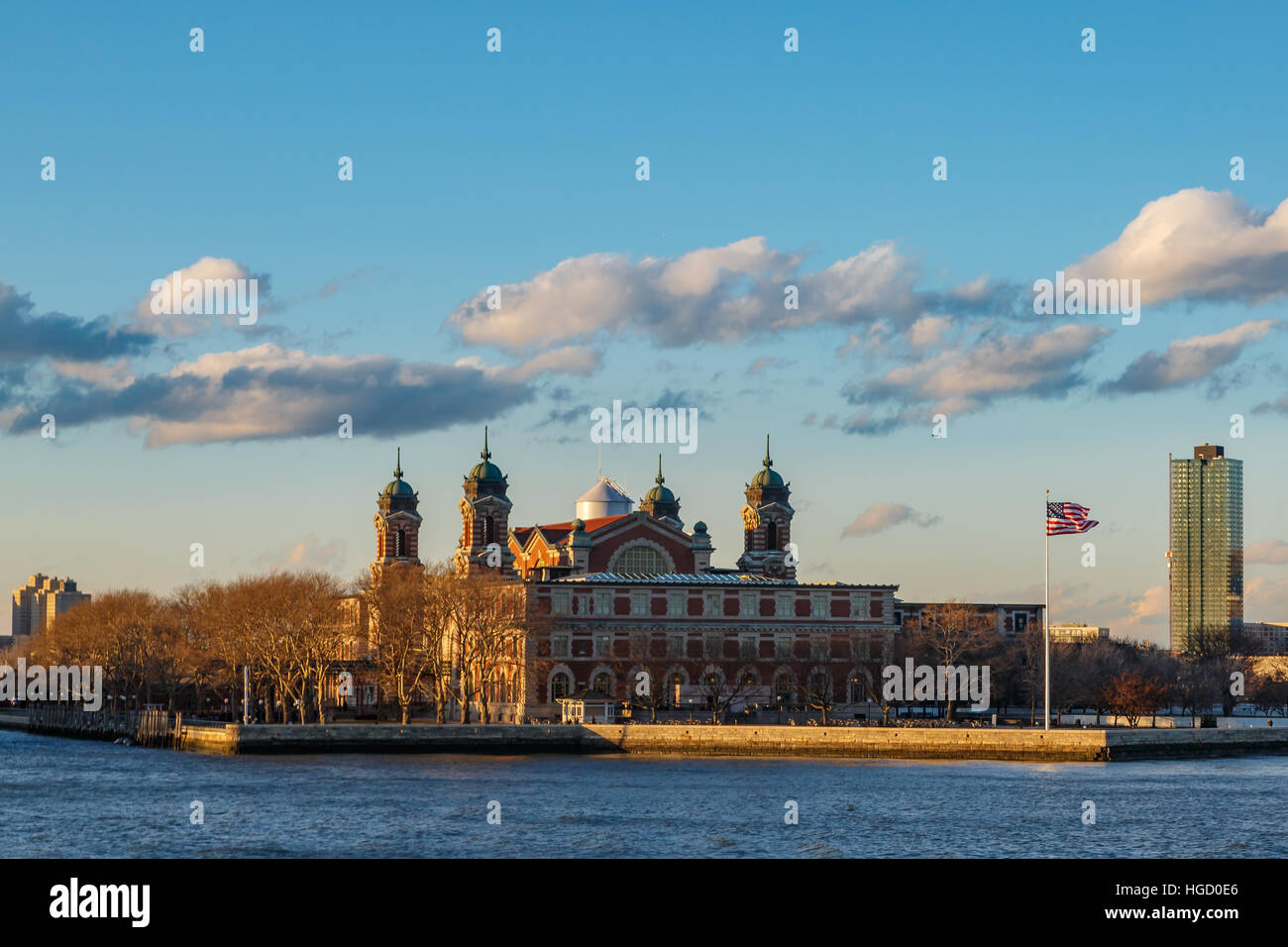 Ellis island from side view in open cloudy sky Stock Photo - Alamy