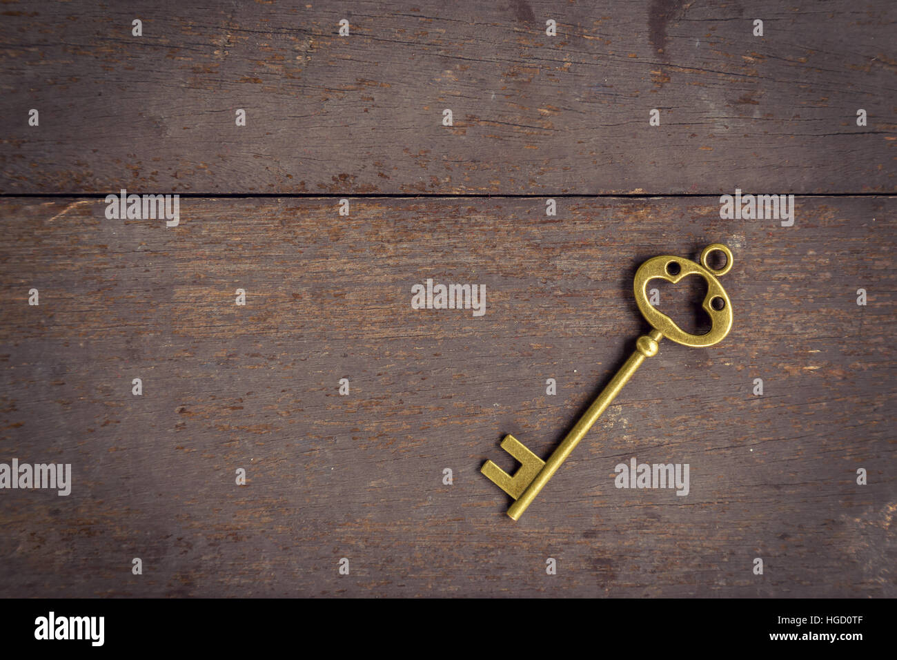 Old key vintage on wood background and texture with space Stock Photo ...