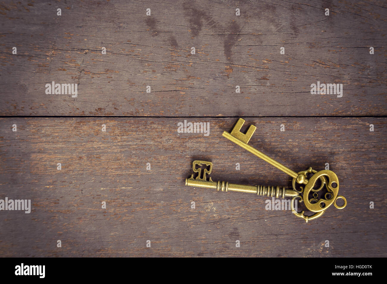 Old key vintage on wood background and texture with space Stock Photo ...