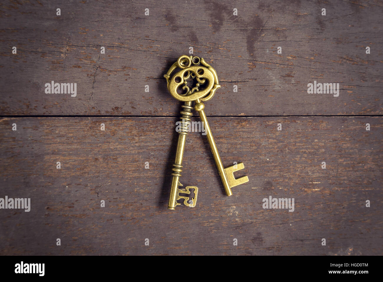 Old key vintage on wood background and texture with space Stock Photo ...