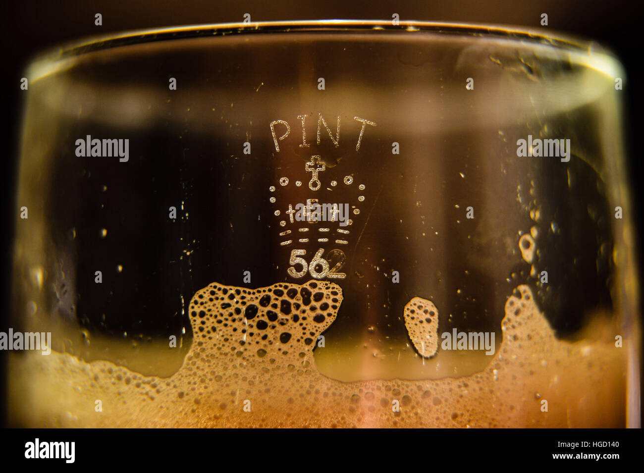 A pint glass etched with the Crown stamp rather than the European CE ...
