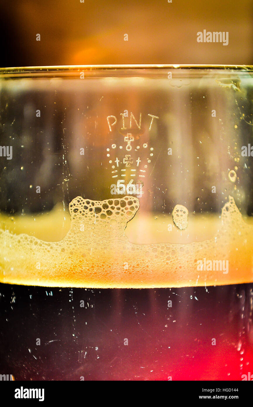 A pint glass etched with the Crown stamp rather than the European CE ...
