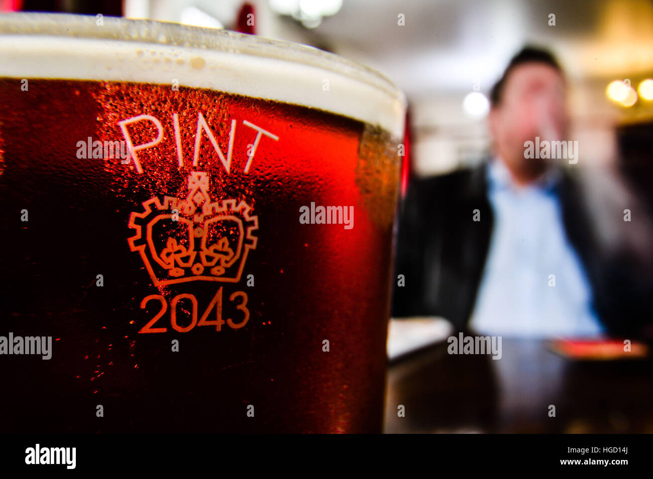 A pint glass etched with the Crown stamp rather than the European CE ...