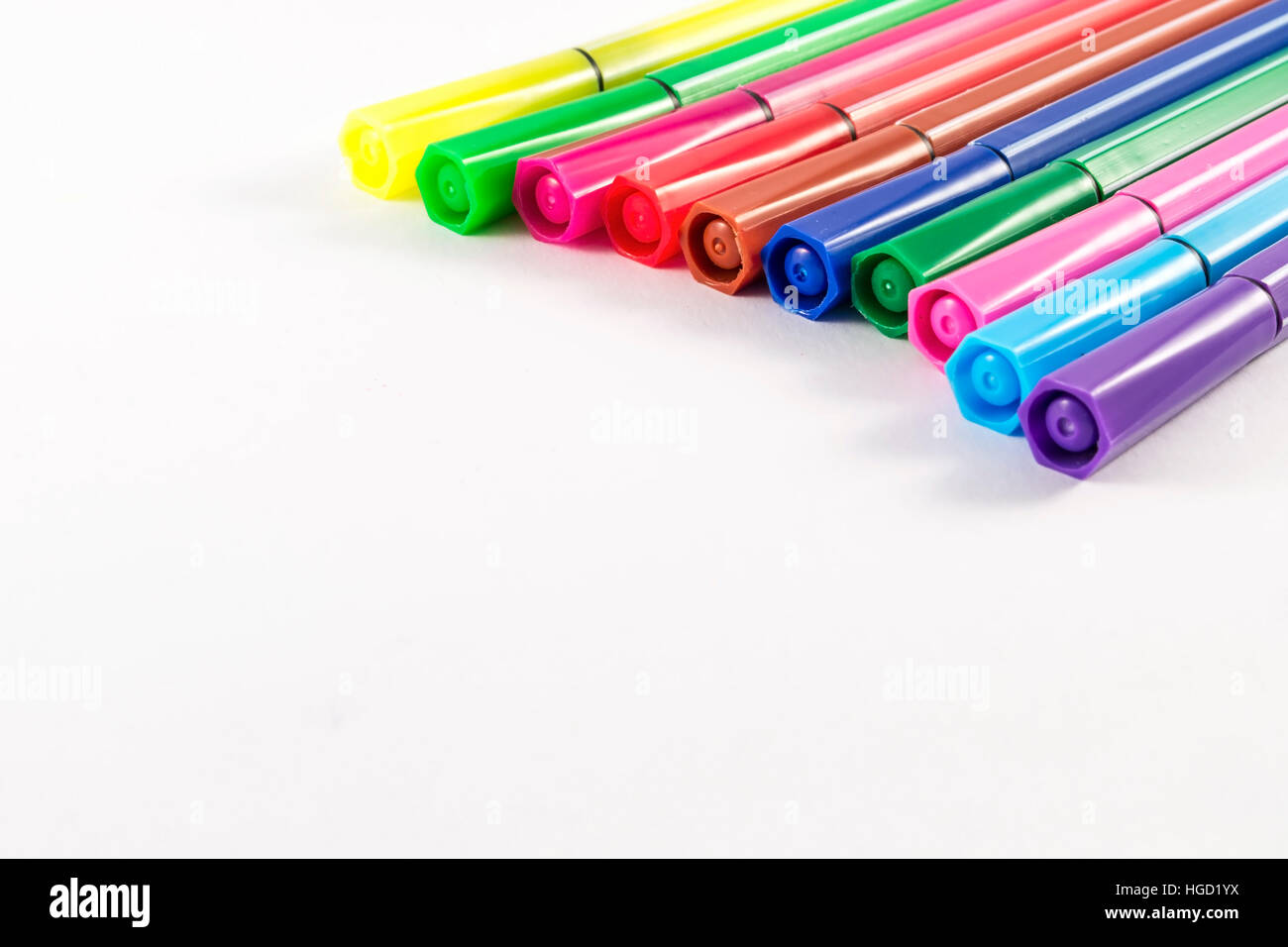Colorful markers on white background Stock Photo - Alamy