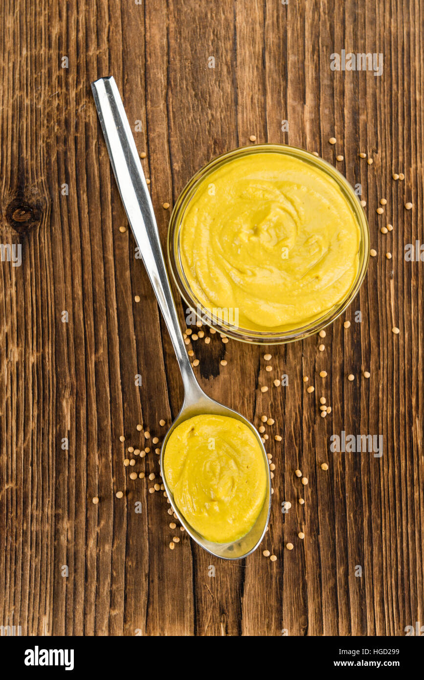 Mustard on a vintage background as detailed close-up shot (selective ...
