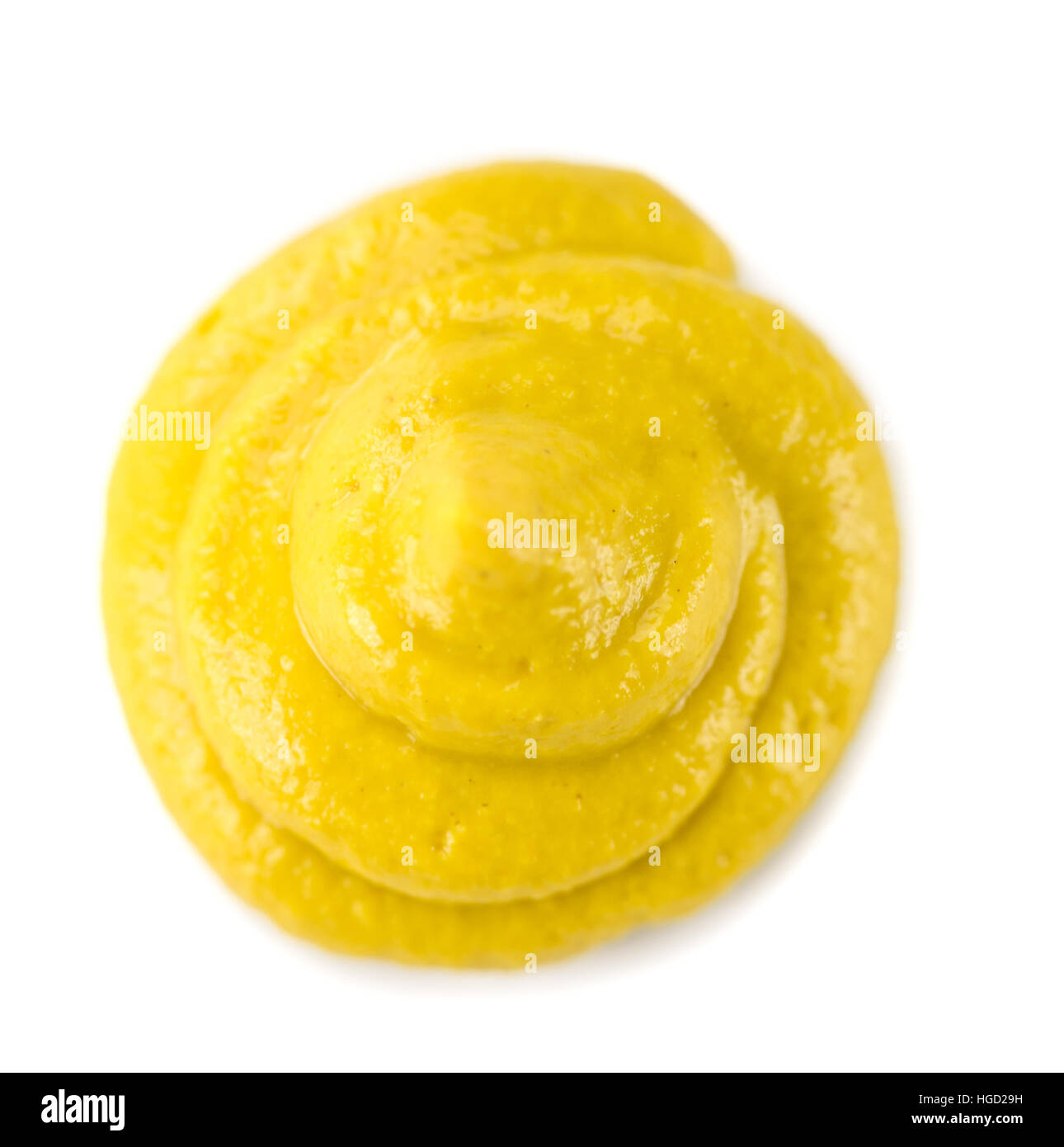 Portion of Mustard (as close-up shot) isolated on white background ...