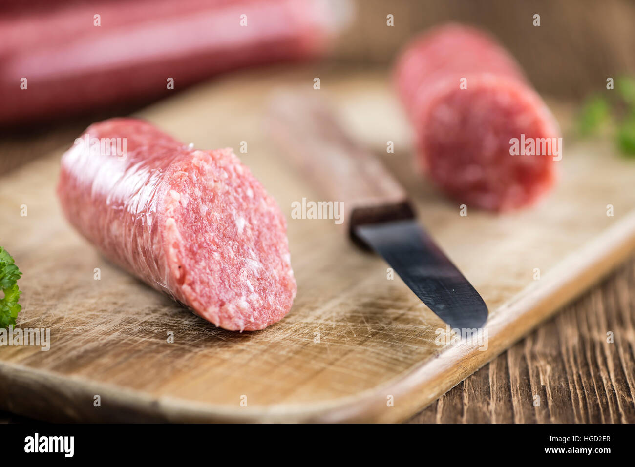 Minced Pork Sausage (German cuisine; selective focus) on wooden ...