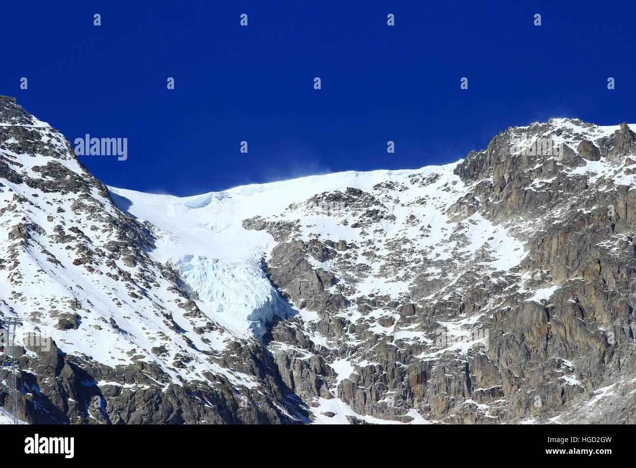 Alpine peaks under snow, winter scene Stock Photo - Alamy