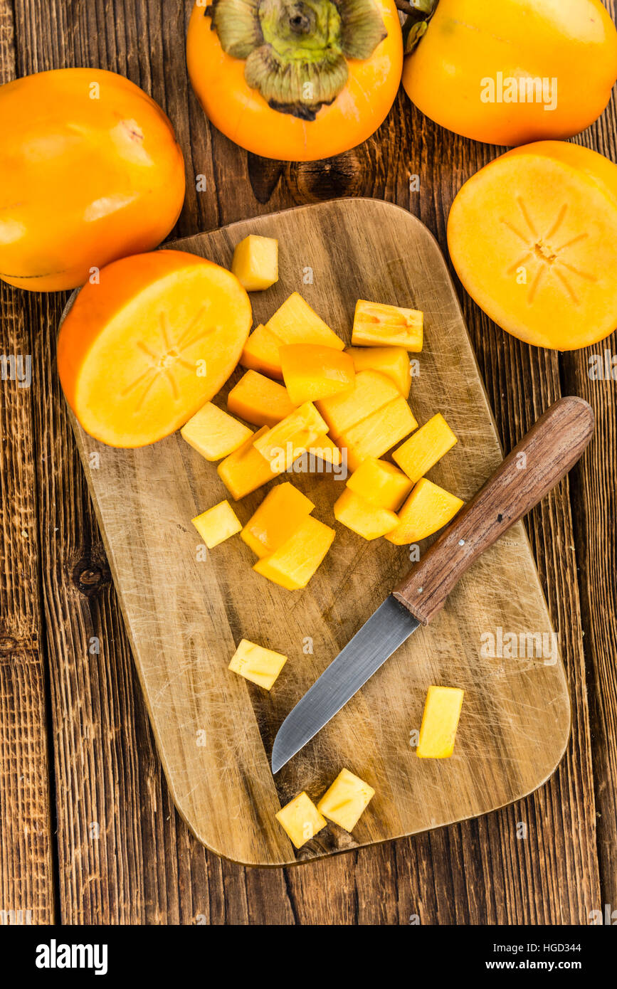 Portion of fresh made Kaki fruits (close-up shot; selective focus Stock ...