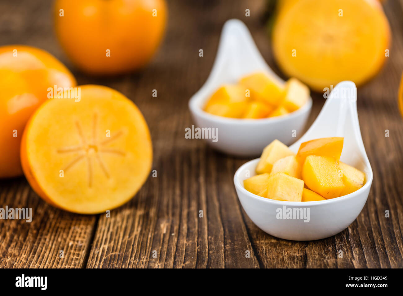 Portion of fresh made Kaki fruits (close-up shot; selective focus Stock ...