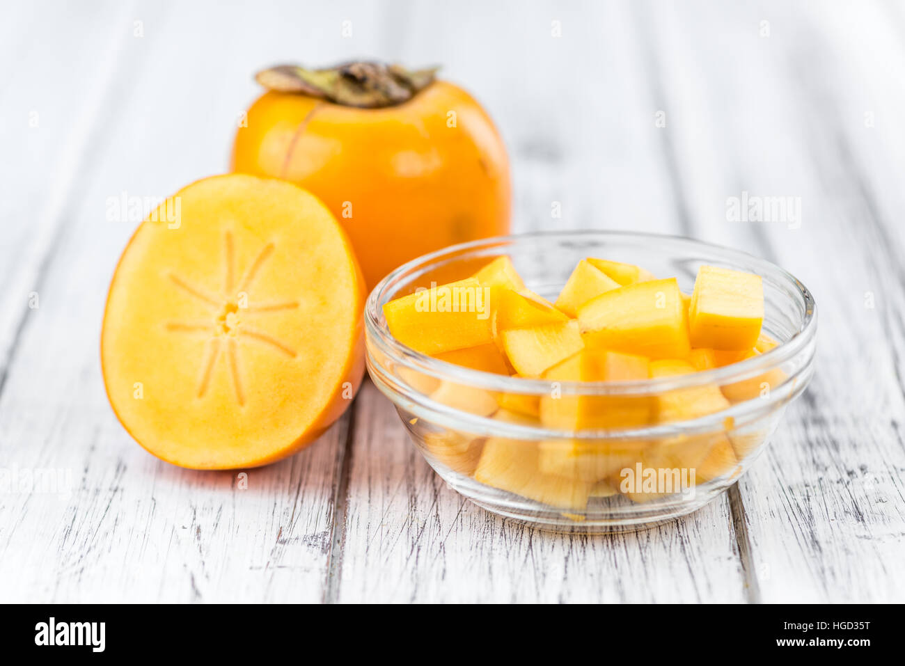 Portion of fresh made Kaki fruits (close-up shot; selective focus Stock ...