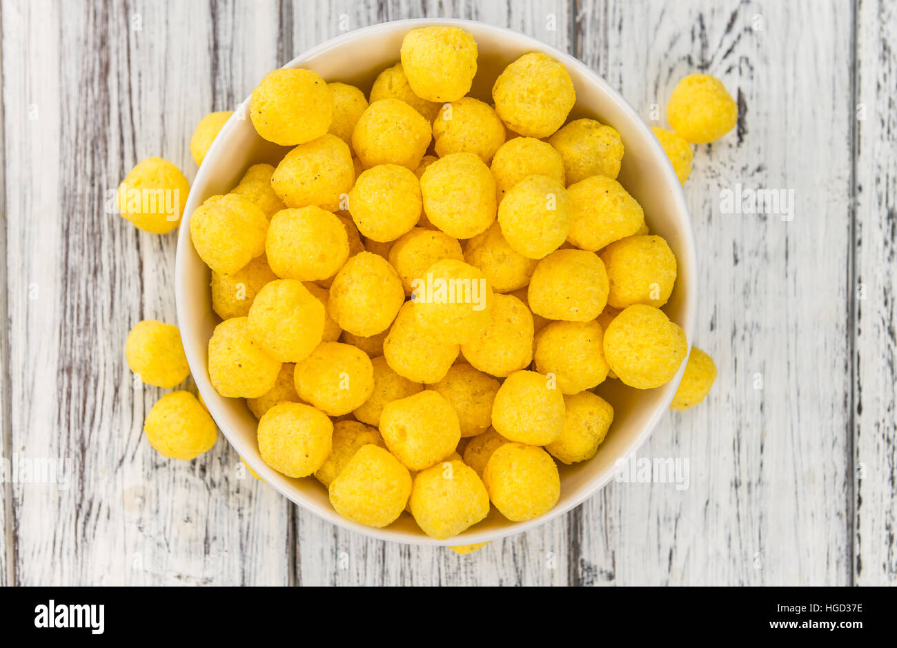 Cheese Balls on rustic wooden background (close-up shot Stock Photo - Alamy