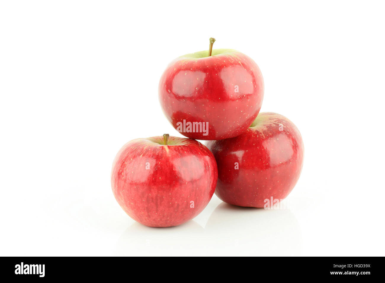 Three apples stacked in a pyramid, three red Stock Photo - Alamy