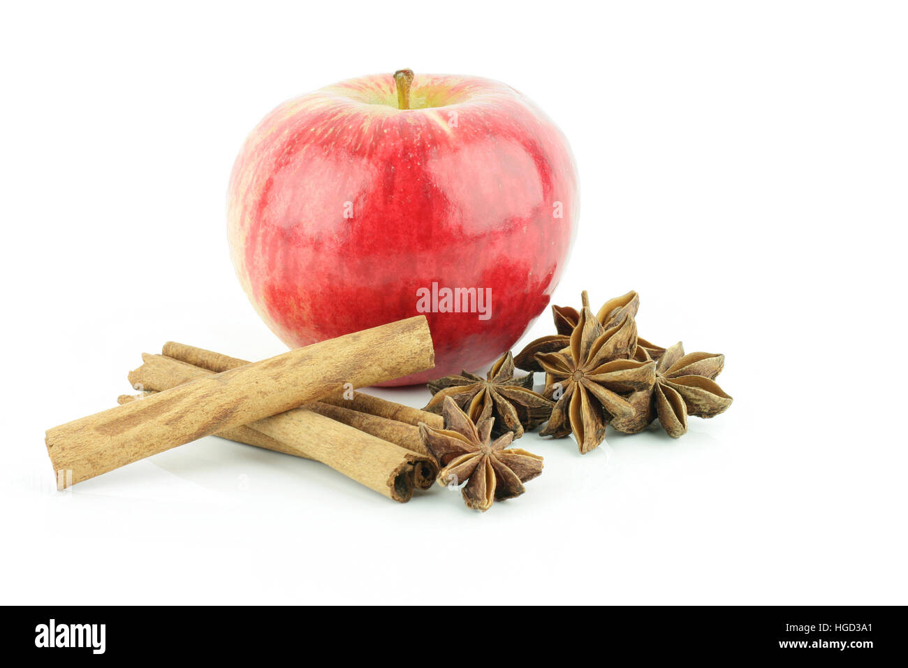 A shiny fresh red Elstar apple (Malus domestica) with cinnamon and star ...