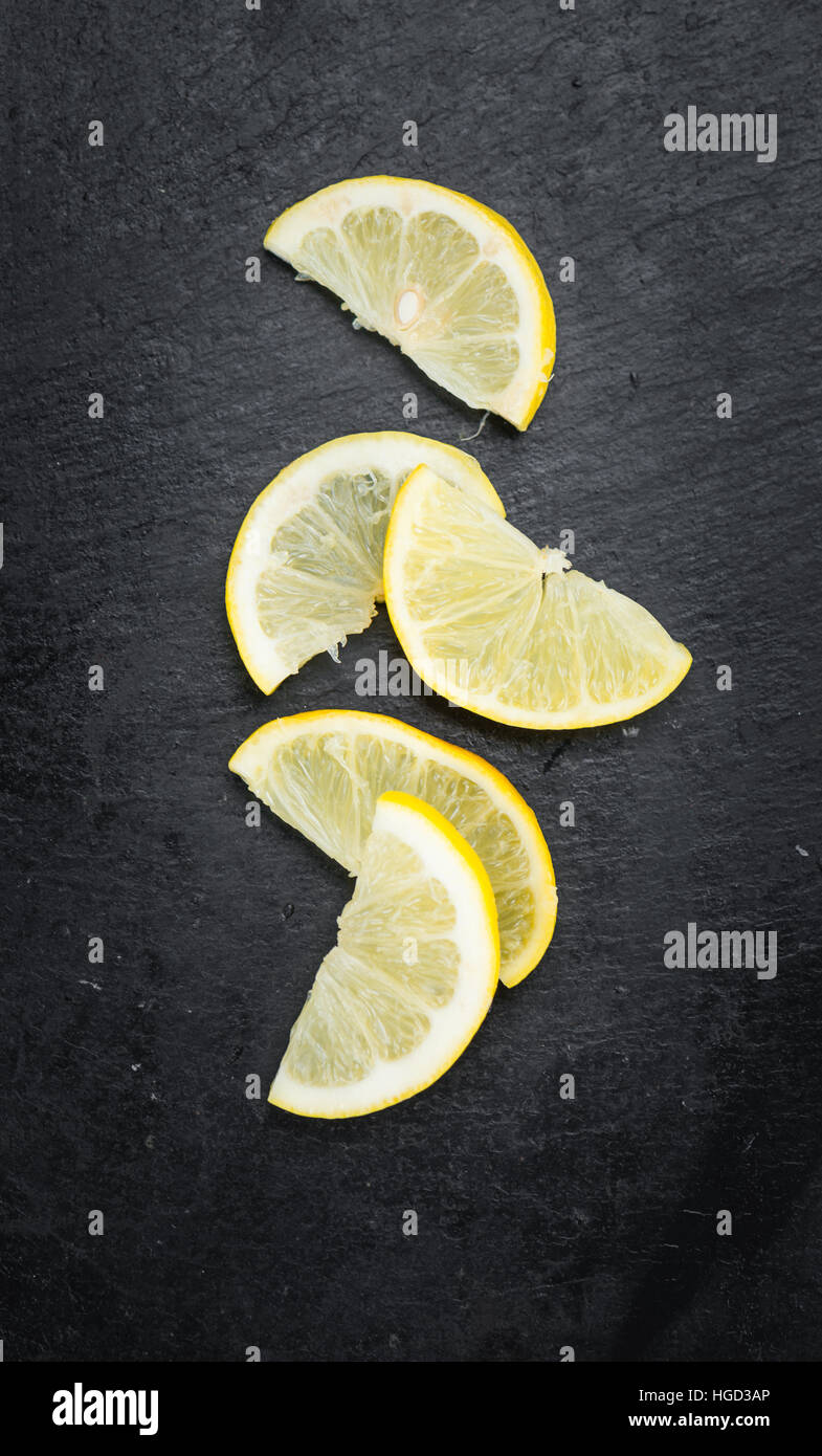 Lemon Slices on a vintage background as detailed close-up shot ...