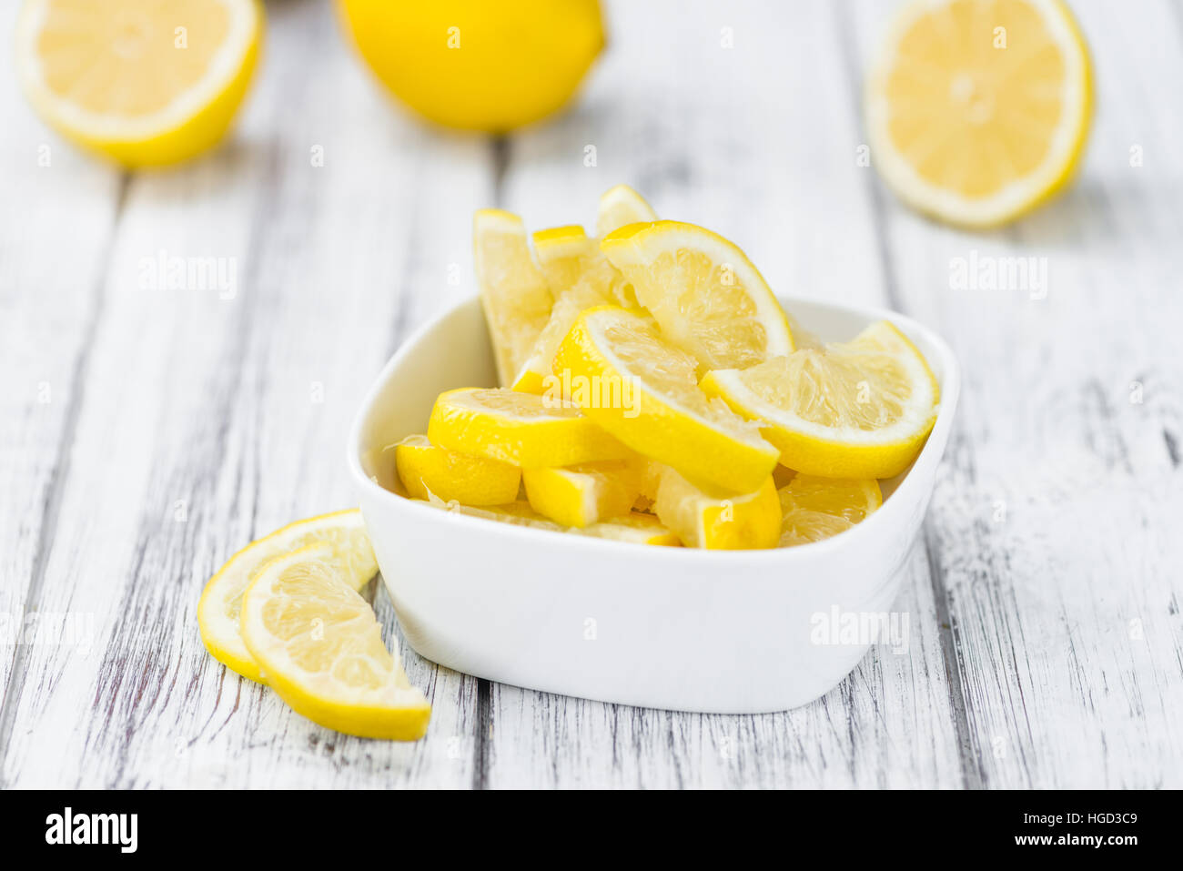 Fresh made Lemon (sliced) on a vintage background (close-up shot Stock ...