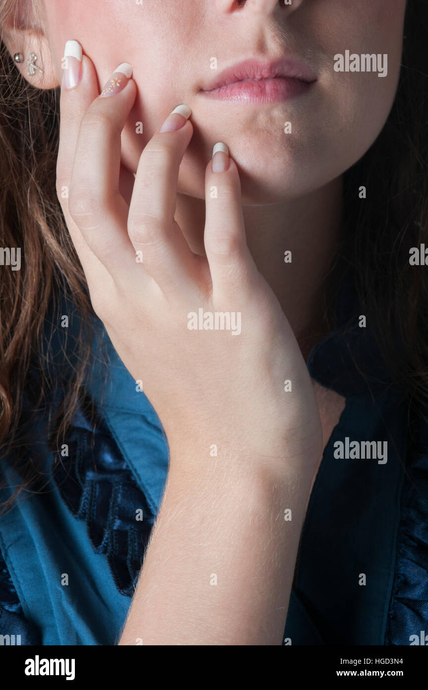 Close up of a woman hand touching face Stock Photo - Alamy
