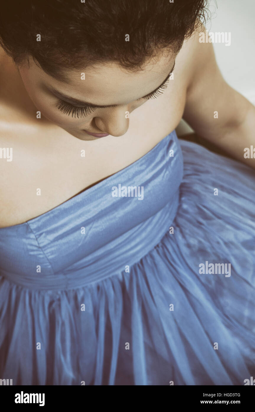 High angle view portrait of a woman looking down Stock Photo - Alamy