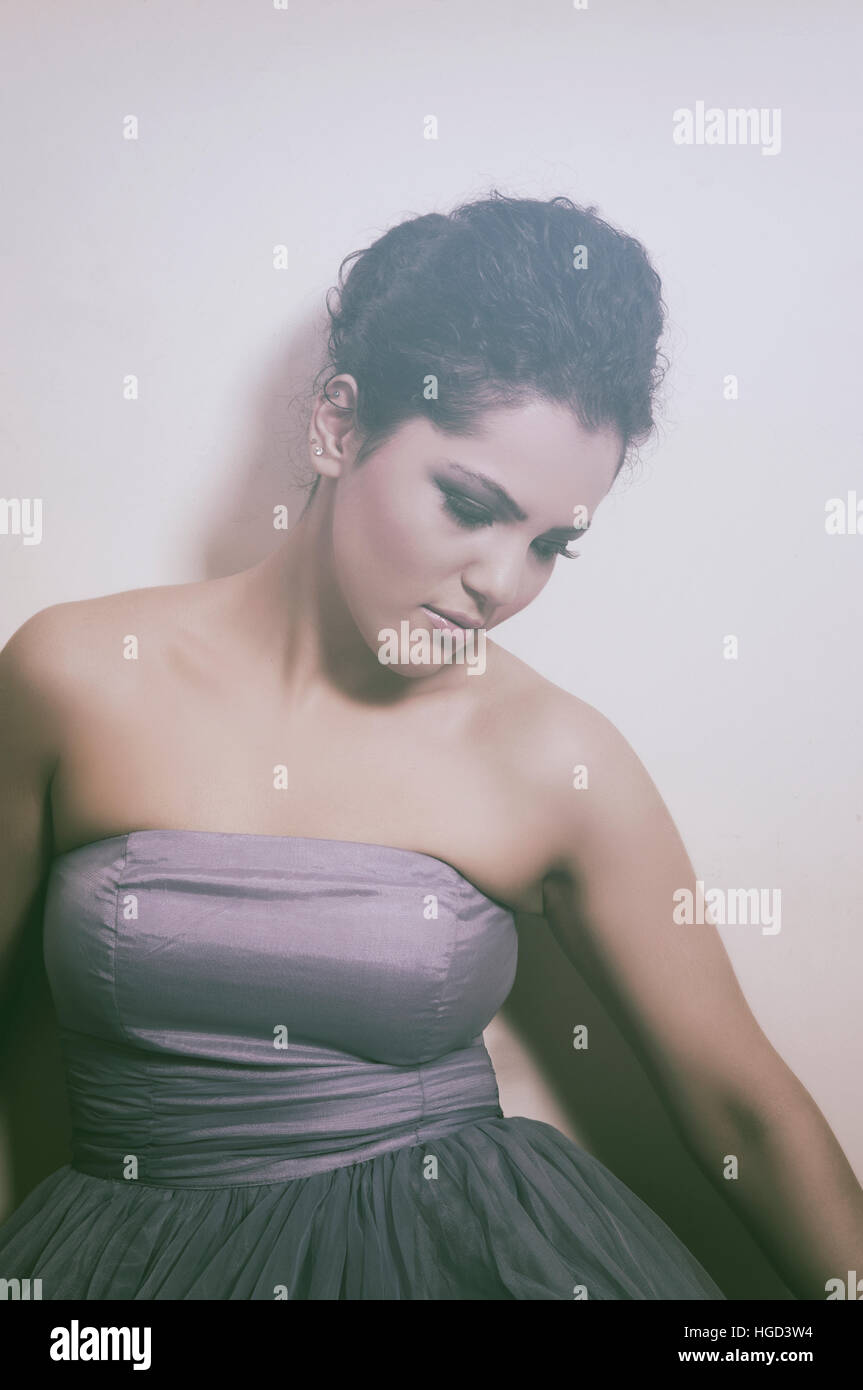 Beautiful woman looking down Stock Photo - Alamy