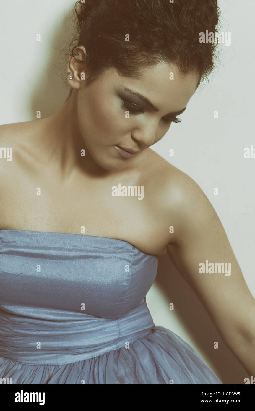 Close up portrait of a beautiful woman looking down Stock Photo - Alamy